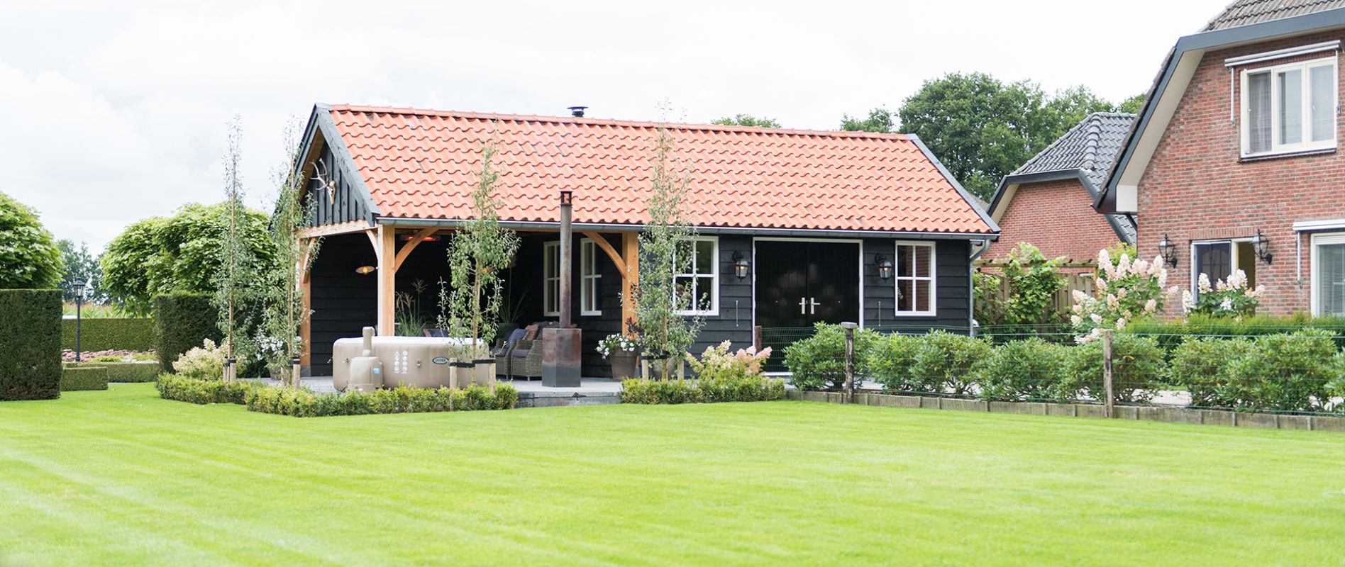 Holzscheune mit Terrassenüberdachung, Uddel | Bronkhorst Gartenhaus